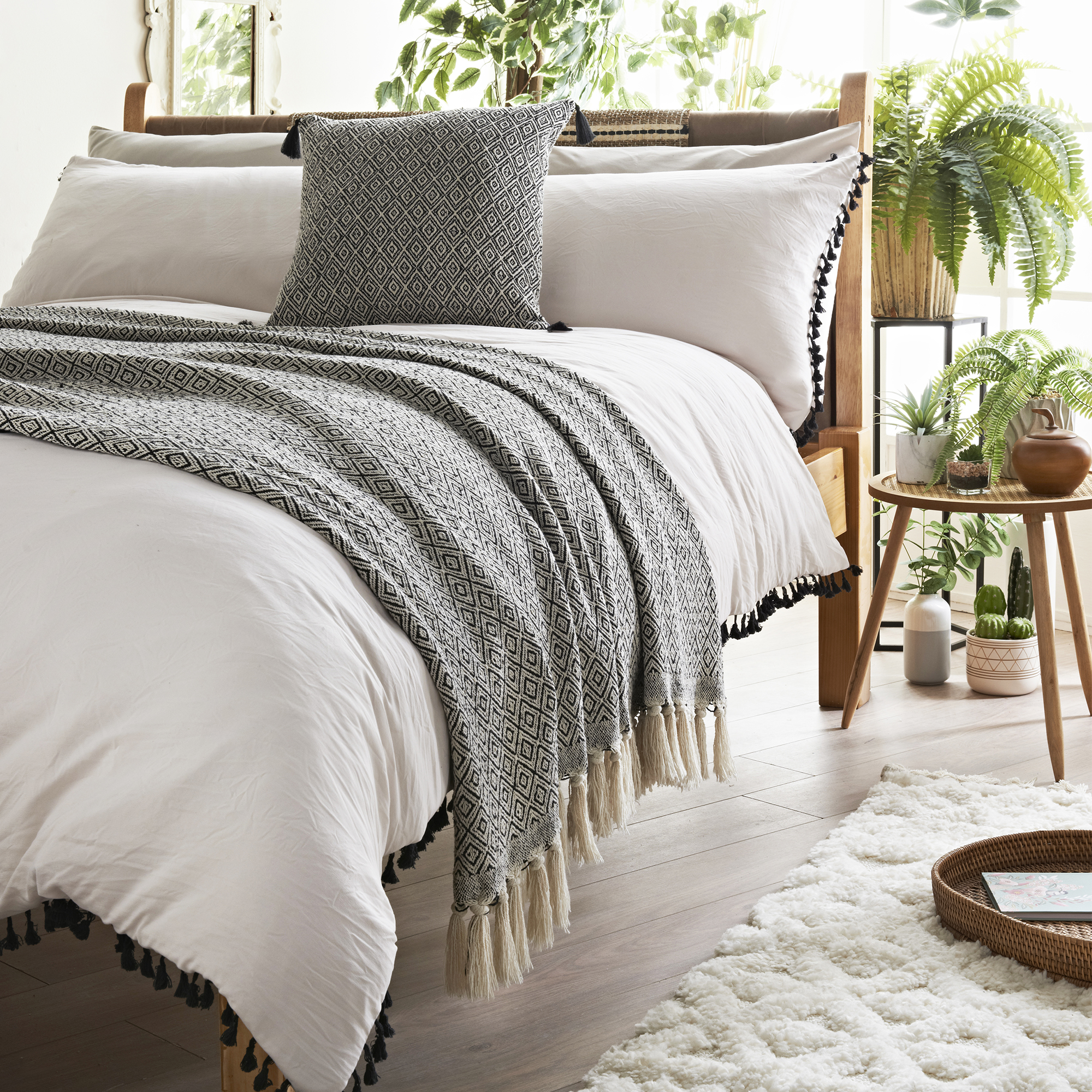 Cosmo Living by Cosmopolitan Geometric Print Tassel Throw